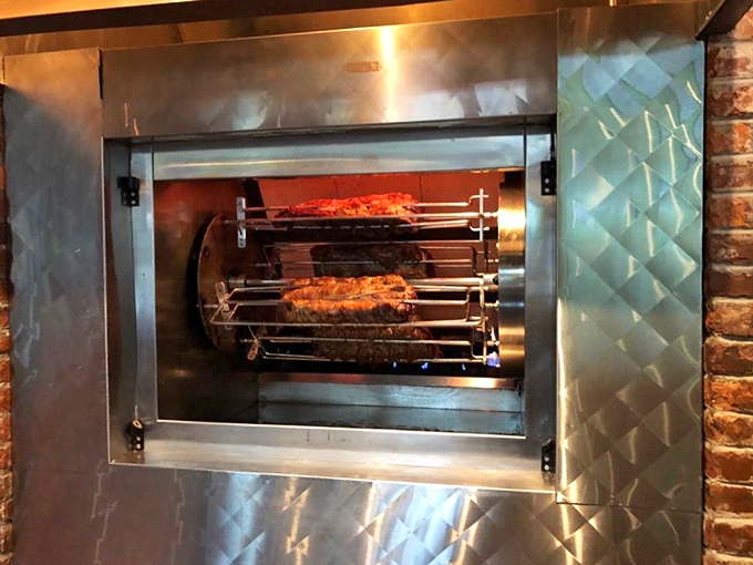 The rotisserie&mdash;the mechanical altar where prime rib achieves its mouthwatering perfection through slow rotation and the patient application of heat. Like watching meat ballet.