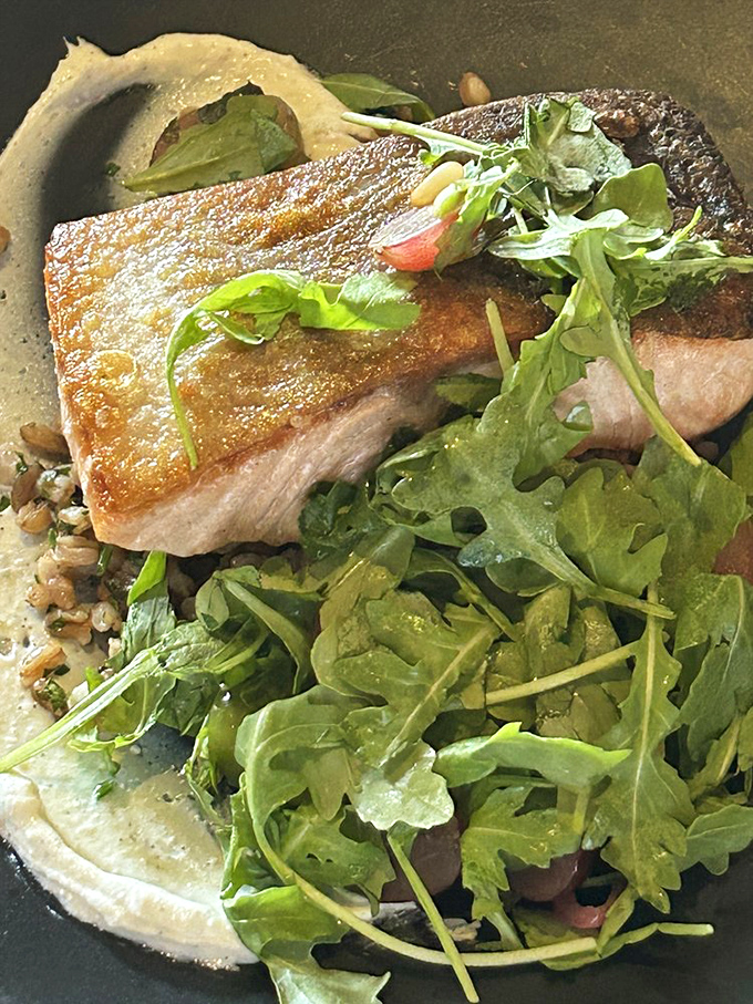 Salmon that's been introduced to heat with respect and dignity. The crispy skin crackles like nature's potato chip.