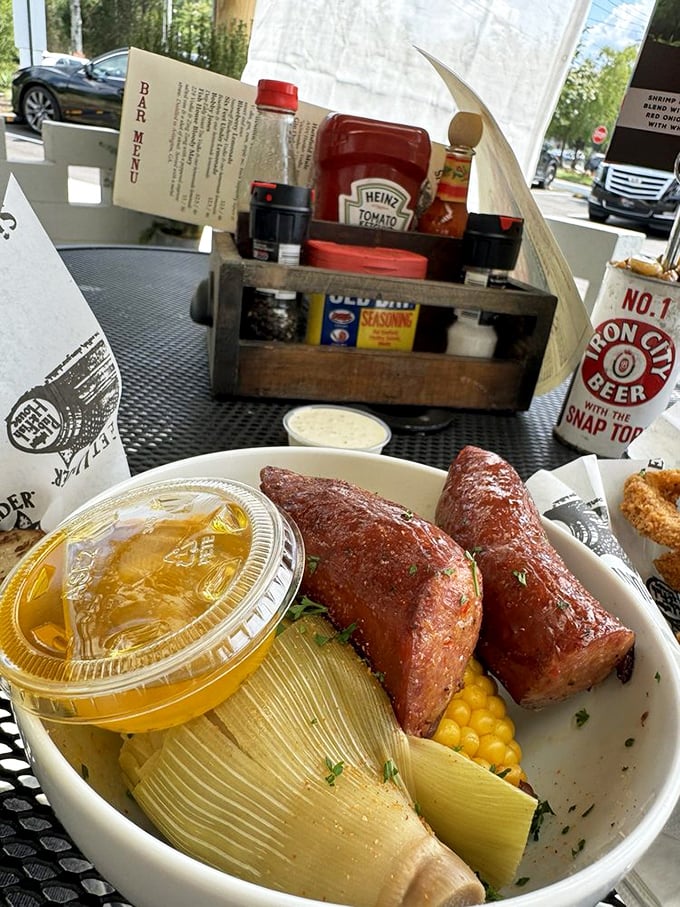 Sausage and corn that would make a backyard BBQ champion weep with joy. Simple food done spectacularly right.