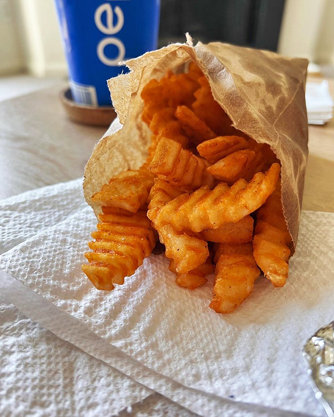 Crinkle-cut fries that crunch like victory. These golden treasures make the perfect supporting cast to your burger blockbuster.