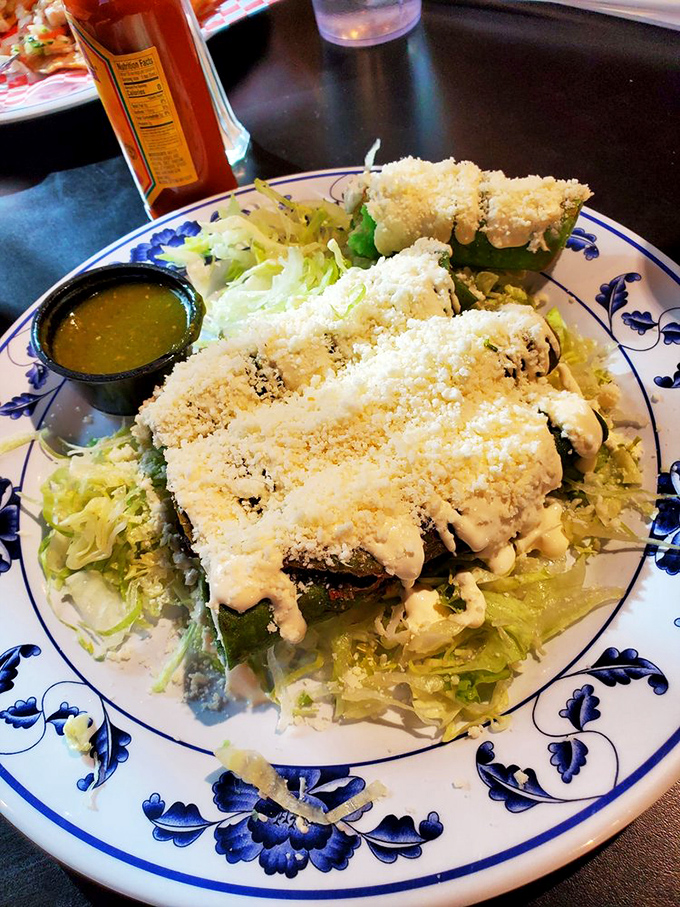 Chile rellenos drowning in creamy sauce and topped with a snowfall of cheese &ndash; vegetables have never had it so good.