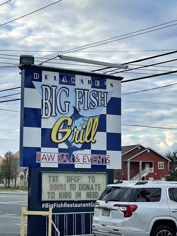 The roadside marquee doesn't just advertise food—it announces a Delaware institution. Even the sign suggests community involvement beyond just great meals.