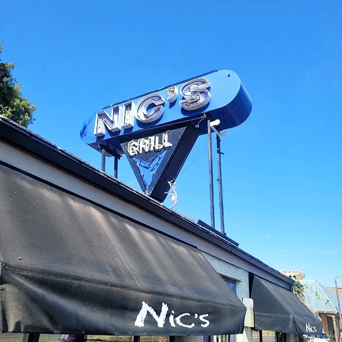 The iconic Nic's sign against Oklahoma's blue sky&mdash;a beacon of hope for burger lovers everywhere and worth every mile of the journey.