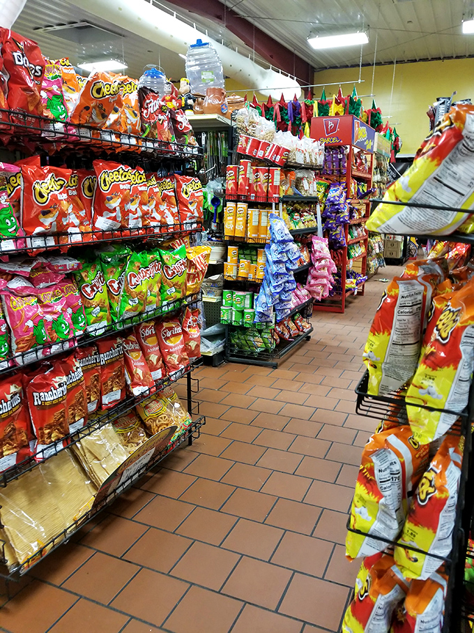 The snack aisle is a colorful explosion of Mexican favorites, where Cheetos have cousins you've never met and chip flavors venture where American versions fear to tread.