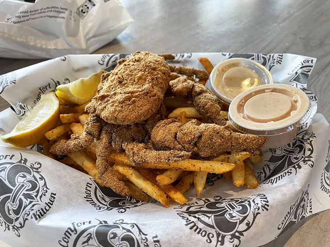 Soft shell crab with attitude, perched atop fries like it owns the place—because it absolutely does.