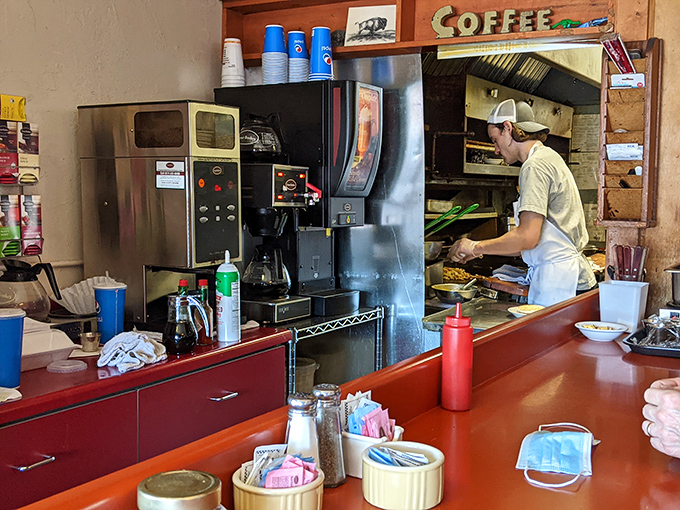 Behind every great breakfast is a focused cook, transforming simple ingredients into morning masterpieces with practiced precision.