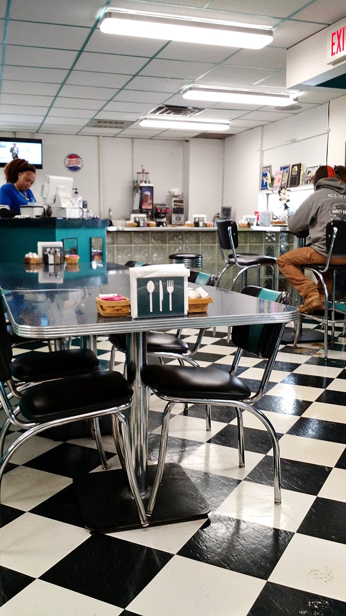 The classic black and white checkered floor isn't just decoration&mdash;it's a statement that some traditions are worth preserving.