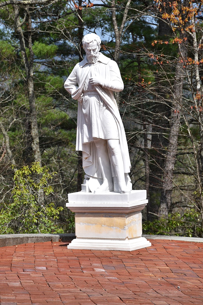 Classical statuary stands sentinel among Georgia pines, creating a surreal juxtaposition of European tradition and Southern landscape. Renaissance meets Appalachia.