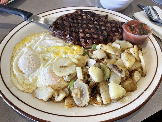The steak and eggs&mdash;a timeless duet that never goes out of style. Those home fries are the backup singers that steal the show.