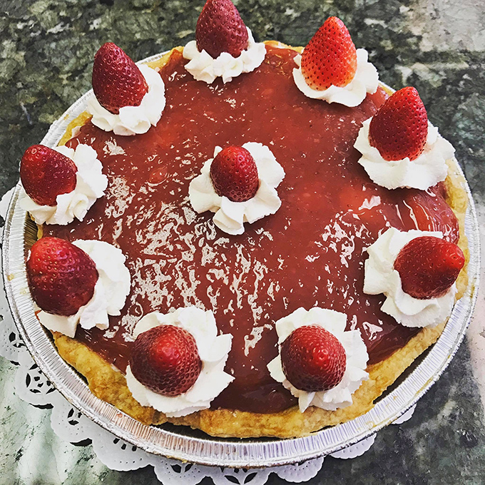 The Strawberry Glac&eacute; pie with its crown of fresh berries and dollops of cream is summer captured in a tin, regardless of the actual season.