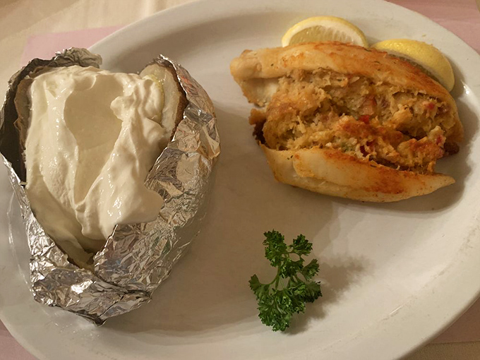 Seafood gets the royal treatment too. That stuffed crab and baked potato prove there's more to life than just steak.