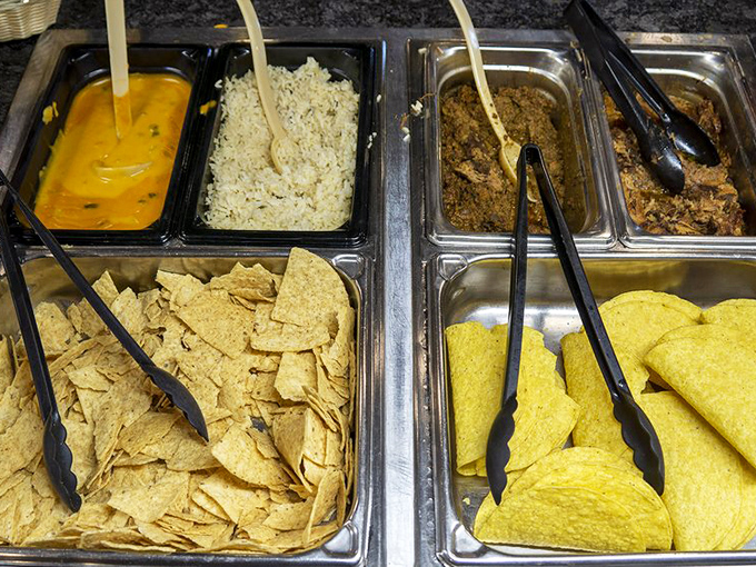 Nacho station: where "just one more chip" becomes the most repeated lie in the buffet experience.