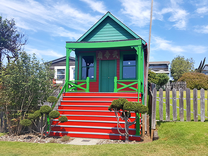 The Temple of Kwan Tai bursts with vibrant greens and reds, proving that good things really do come in small, culturally significant packages.