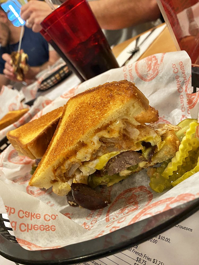 Behold the Triple D Melt in all its glory. Multiple layers of flavor architecture that somehow fits between two slices of bread.