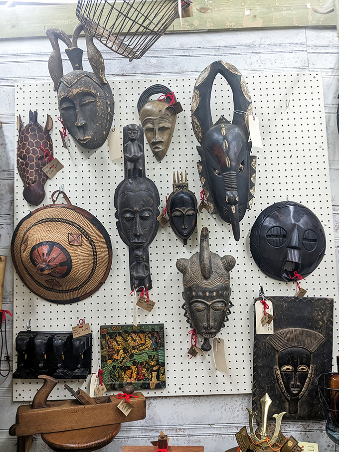 These African masks and artifacts create a museum-worthy display, each piece carrying stories from continents away into the heart of Arkansas.