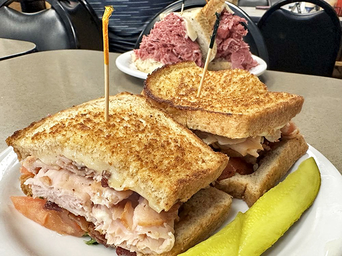 The turkey club: for when you want to feel virtuous while still indulging. That pickle isn't just garnish—it's nature's palate cleanser.