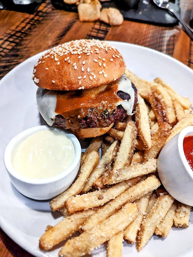 Wagyu burger bliss! This beefy beauty is stacked higher than a Jenga tower and twice as likely to make you say "Oh no!" when it's gone.