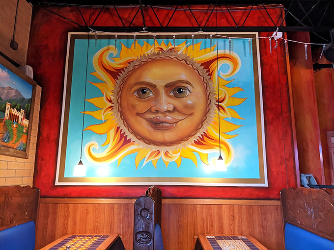 The watchful sun mural oversees your dining experience. In Mexican folklore, a smiling sun means your tacos will be exceptional.