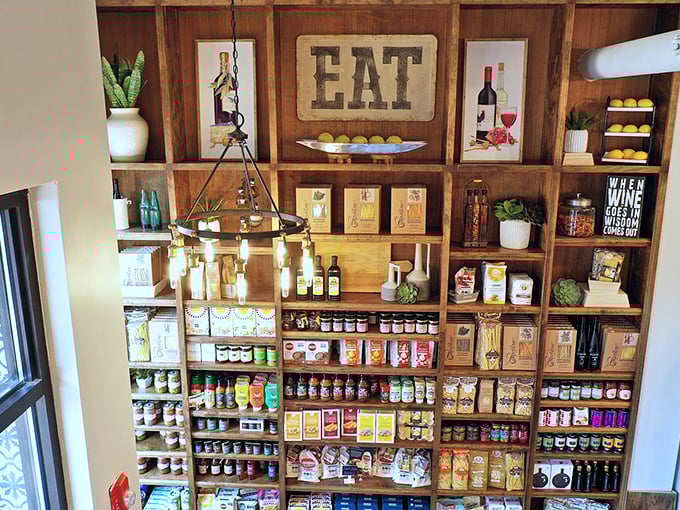 Not just shelves, but a carefully curated gallery of flavor possibilities. That "EAT" sign isn't a suggestion&mdash;it's a command worth following.