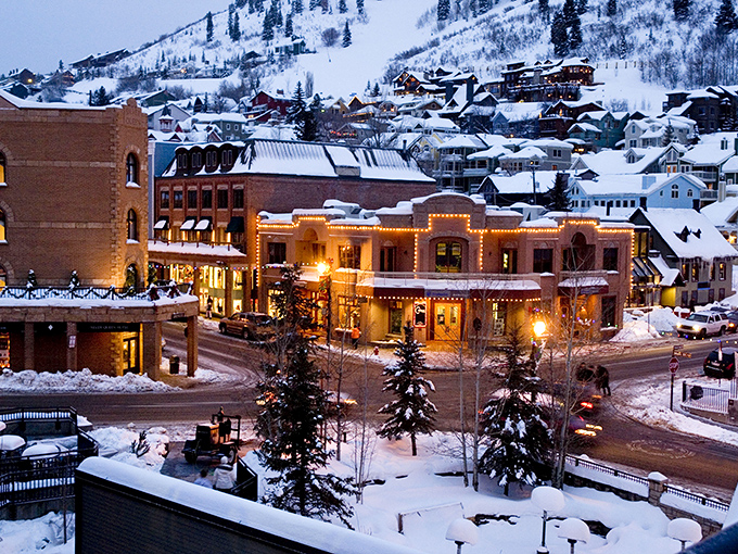 Summer at the reservoir means paddleboards, mountain views, and the strange realization that you're standing where skiers glide in winter.