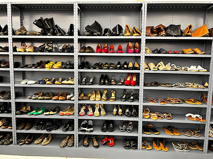 A shoe lover's paradise arranged with military precision. These shelves tell stories of dance floors, job interviews, and special occasions waiting for their next chapter. 