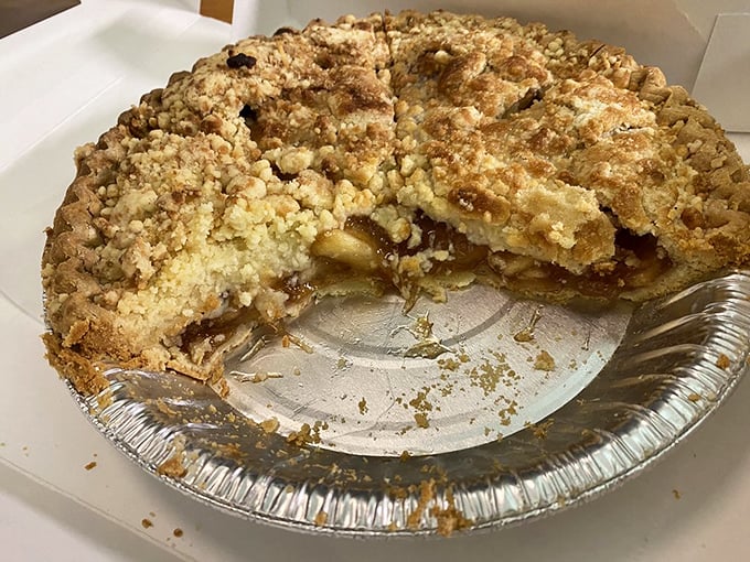 The apple crumble pie shows its inner secrets&mdash;tender fruit and buttery topping that would make even grandma slightly jealous.