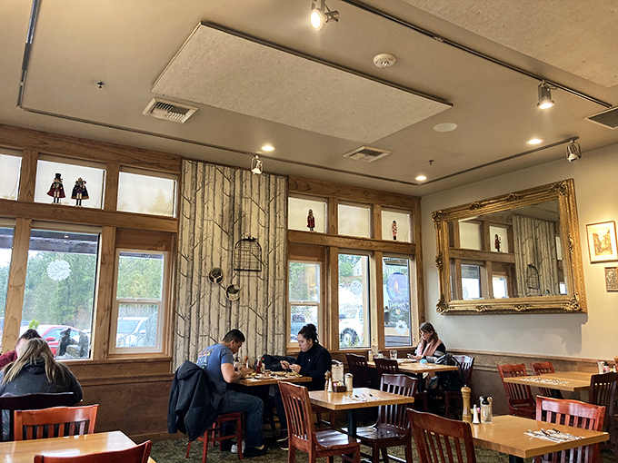 The birch wallpaper, wooden accents, and golden light create the breakfast equivalent of a warm hug from your favorite aunt.