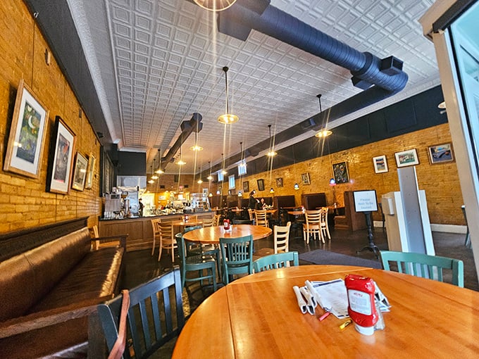 Exposed brick, pressed tin ceilings, and comfortable booths&mdash;The Bluebird's interior feels like the Kentucky hug you didn't know you needed.