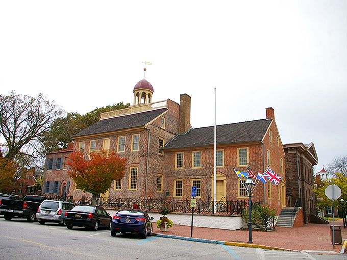 Autumn paints the courthouse in seasonal splendor, proving that even buildings dating to 1732 appreciate a good wardrobe change.