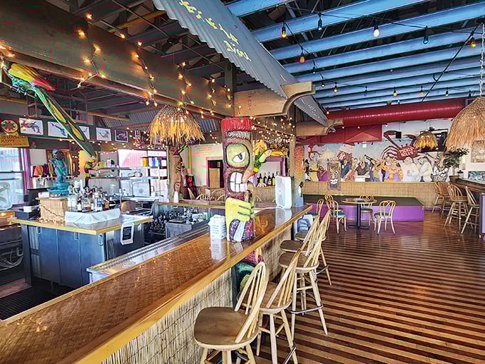 Tiki-inspired decor meets nautical charm at the bar. Those string lights aren't decoration &ndash; they're illuminating your path to seafood nirvana.