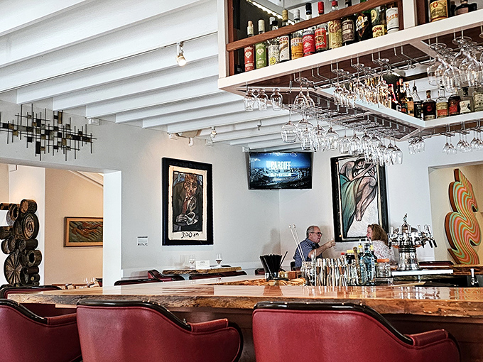 Not just a bar, but a liquid library where conversations flow as smoothly as the carefully curated spirits.