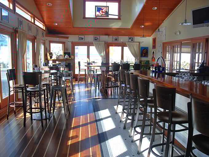Sunlight streams through windows in the bar area, creating natural spotlights for your cocktail's grand entrance.