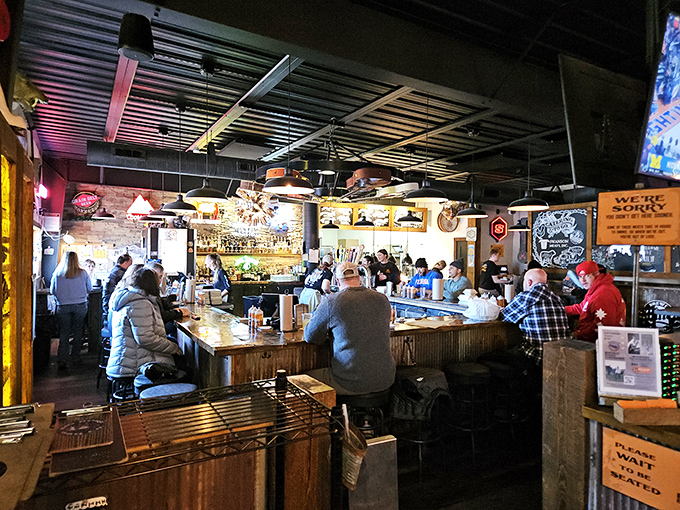 The bar area buzzes with anticipation as patrons perch on stools, waiting for their meaty rewards. This is barbecue's front row.
