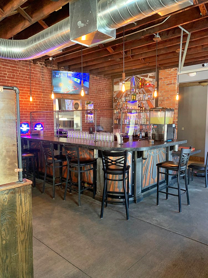 The bar at Empire Tacos isn't just serving drinks&mdash;it's serving possibilities. Exposed brick and pendant lights create the perfect backdrop for margarita-fueled conversations.