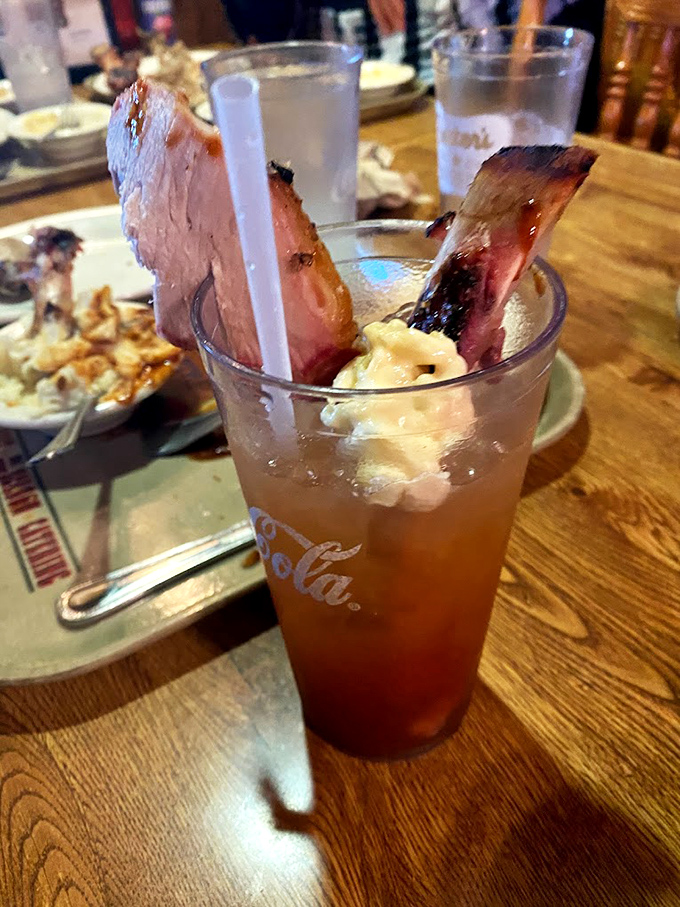 That's not just a drink—it's a swimming pool for meat. When your barbecue needs its own diving board, you're doing something right.