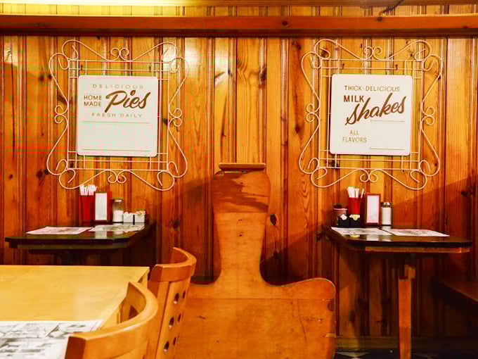 Two small wooden booths, promising both privacy and proximity to pie &ndash; the architectural equivalent of a warm hug.