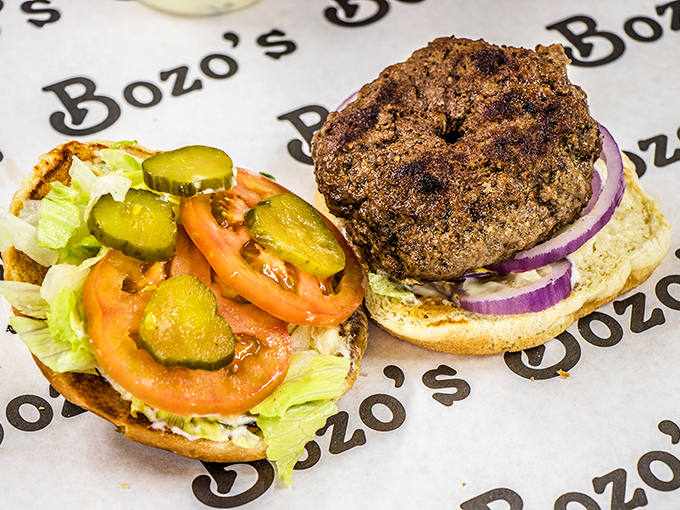 The hamburger that dares to compete in a seafood joint&mdash;and somehow holds its own. Those pickles and veggies aren't just garnish, they're necessary balance.