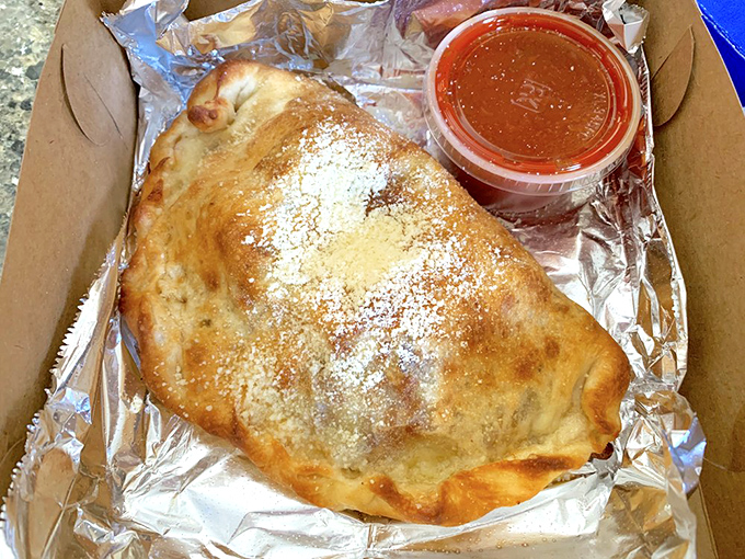 The calzone: Italy's way of saying, "You know what would make pizza better? Folding it and hiding more cheese inside."