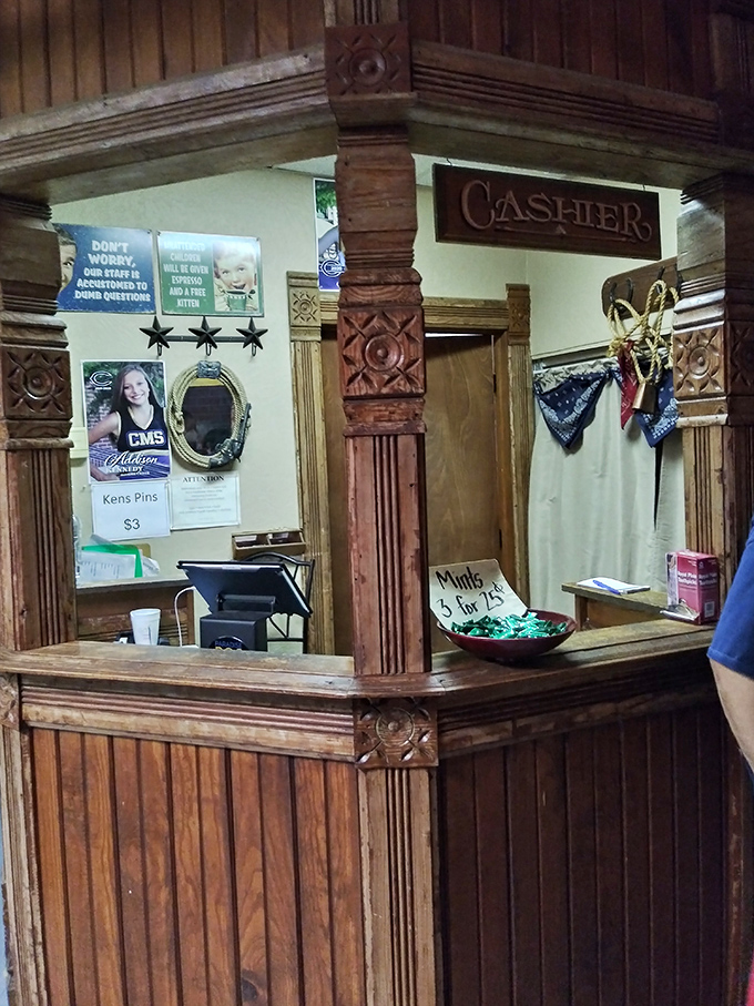 The cashier's station, with its carved wooden details, feels like stepping into a time when transactions ended with a handshake.
