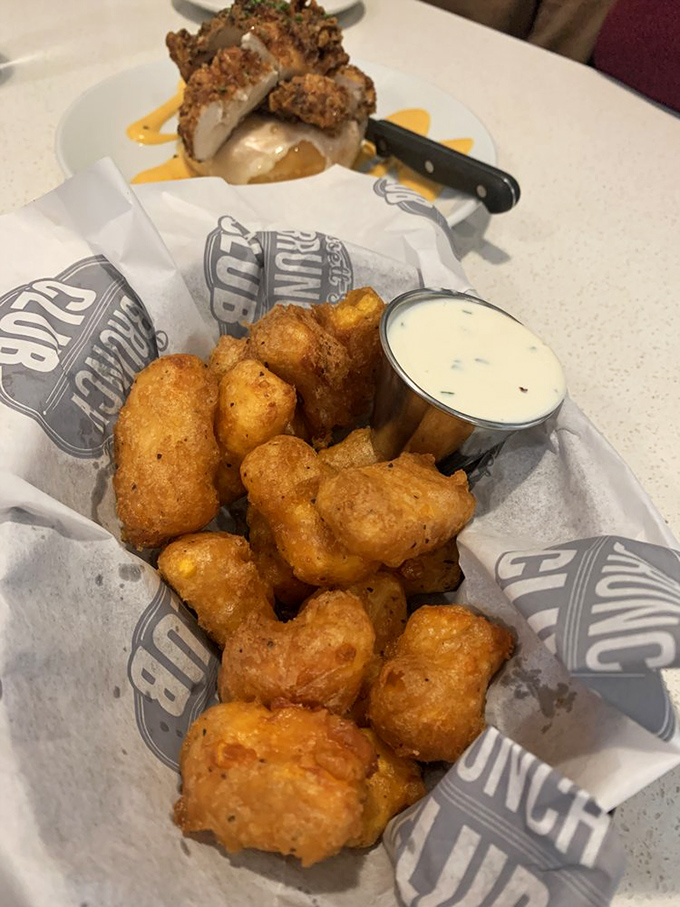 Cheese curds that demand to be photographed before being devoured. Golden, crispy perfection served with dipping sauce for maximum enjoyment.