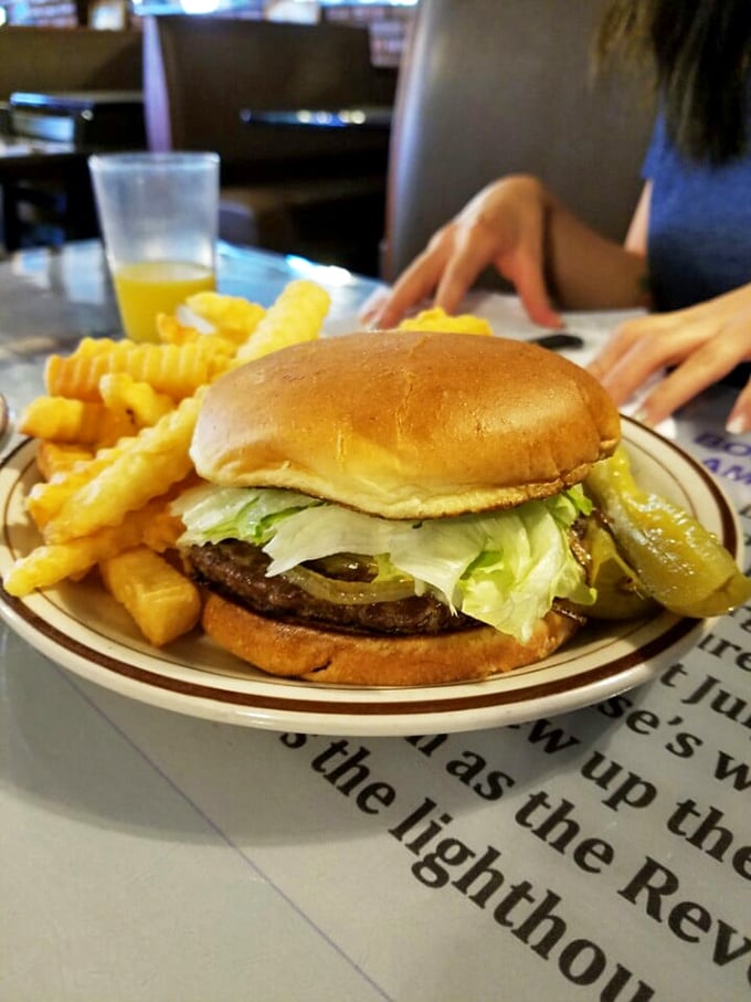 A classic diner burger with crinkle-cut fries&mdash;no pretentious aioli or artisanal bun, just honest-to-goodness American comfort on a plate. 