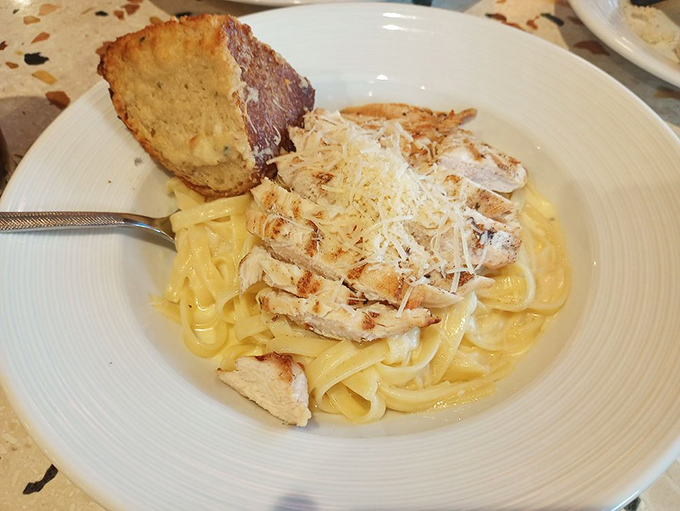 Pasta that's dressed for success with perfectly grilled chicken and a creamy sauce that would make an Italian grandmother secretly take notes.