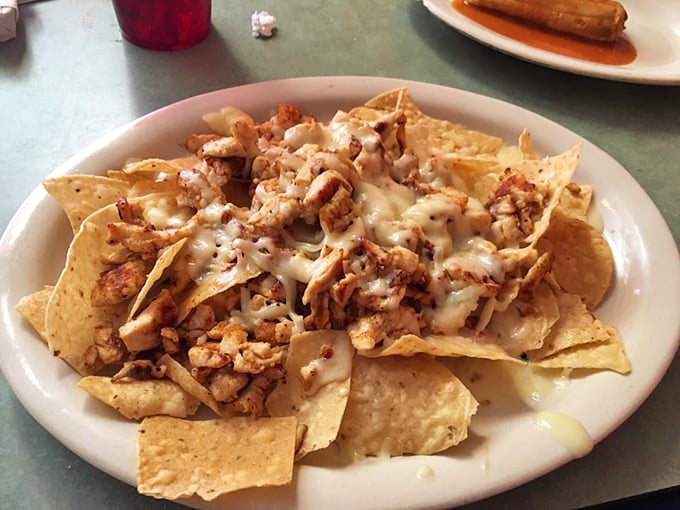 Nachos that achieve the perfect chip-to-topping ratio&mdash;an architectural marvel of crunch, cheese, and seasoned chicken that defies gravity and restraint.