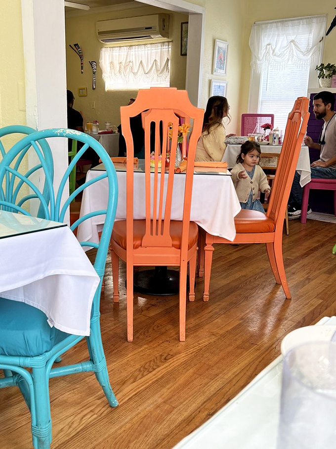 Families gather around tables where generations share not just meals but moments—the true magic of a neighborhood breakfast spot.