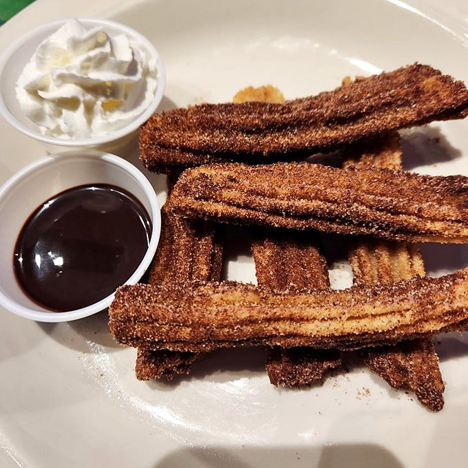 Churros aren't just dessert—they're cinnamon-sugar dreams that transport you straight to a Mexican street fair with every bite.