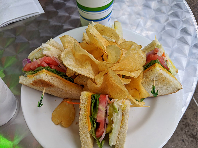 Club sandwiches: the triple-decker architectural marvel of lunchtime. Notice the perfect geometric arrangement that satisfies both stomach and soul.