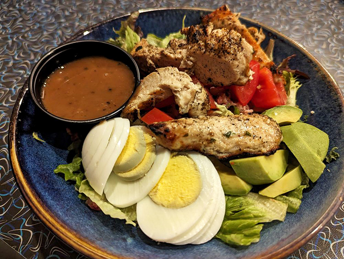 A salad that proves vegetables can party too&mdash;especially when dressed up with chicken, eggs, and avocado in their Sunday best.