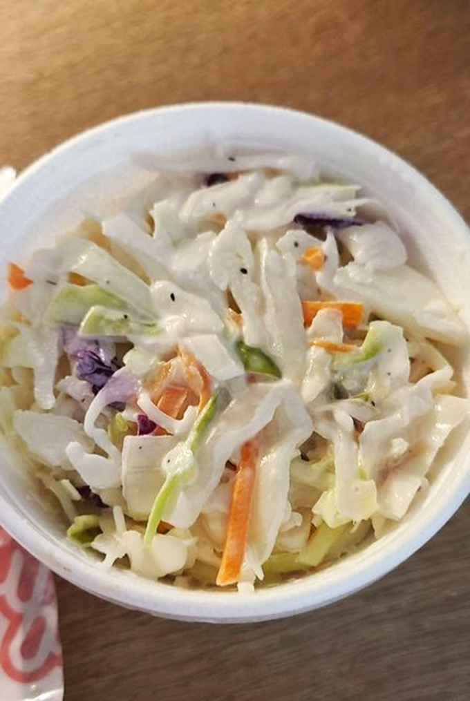 Creamy coleslaw: the unsung hero of the cheesesteak experience. A cool, crunchy counterpoint to all that meaty, cheesy glory.