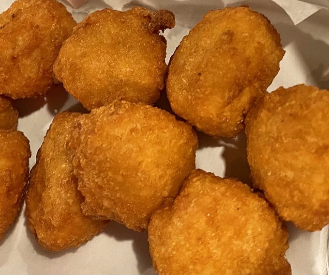 Golden nuggets of deep-fried joy &ndash; proof that sometimes the best things in life are simple, crispy, and served in a paper basket.