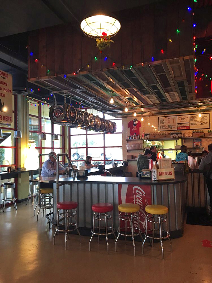 The counter area feels like a friendly diner from a bygone era. Those red stools have witnessed countless first bites and satisfied sighs.